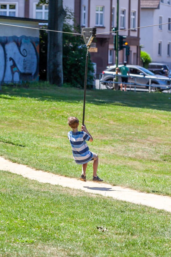 Happy Kid on Zip Line in the City of Essen - Germany Stock Photo ...