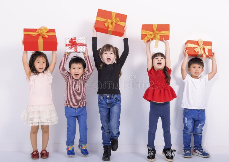 Happy Kids Celebrating Holiday and Showing the Gift Box Stock Photo ...