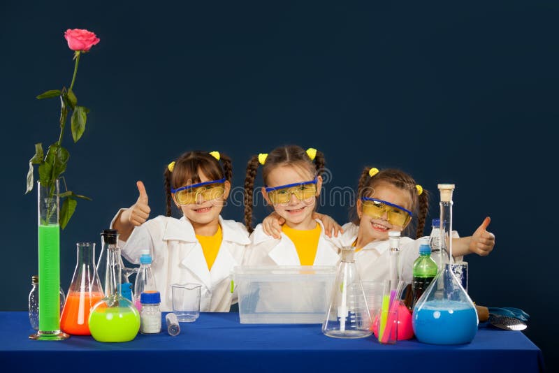 Happy Kids Doing Science Experiments in the Laboratory. Stock Photo ...