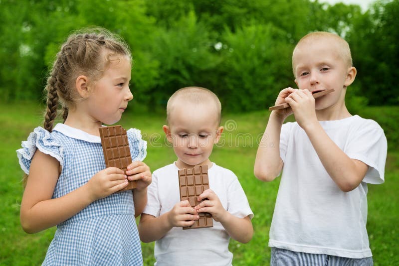 Happy Kids Eating Chocolate Stock Image - Image of enjoyment, eating ...