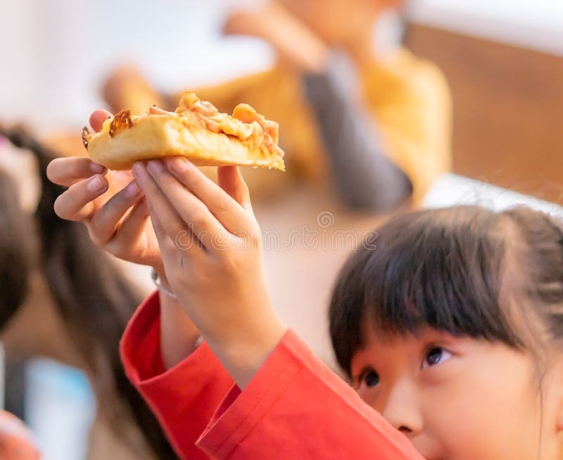 Happy Kids Eating Delivery Pizza in Classroom Stock Photo - Image of ...