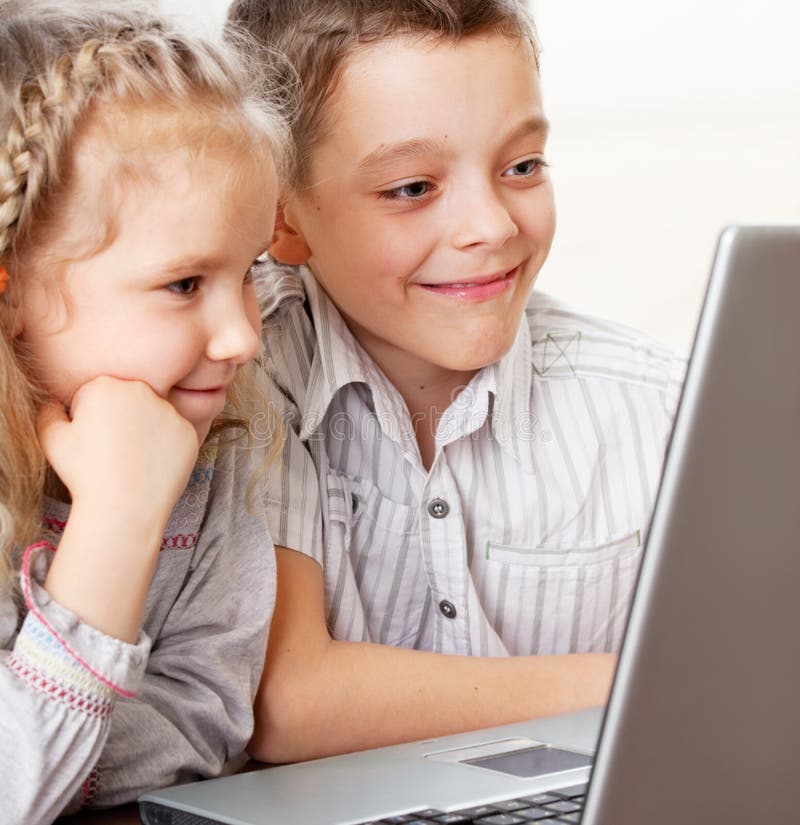 Happy kids with laptop stock image. Image of little, brother - 65208331