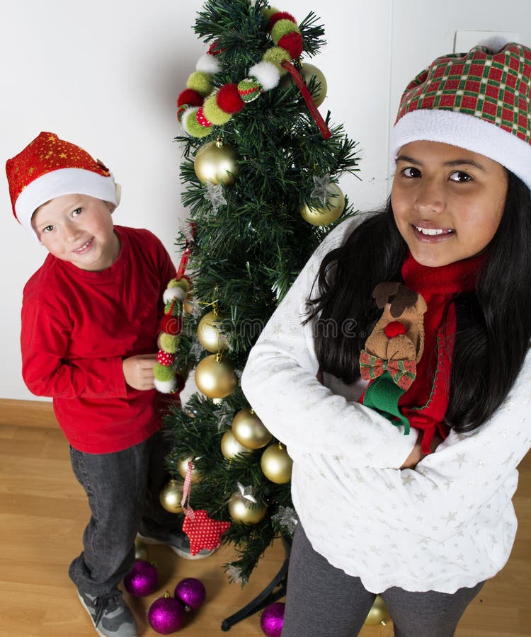 Happy Kids Laying Under the Christmas Tree. Stock Image - Image of ...