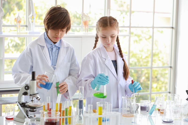 Happy Kids Making Science Experiments. Education and Scientist Concept ...