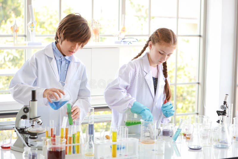 Happy Kids Making Science Experiments. Education and Scientist Concept ...