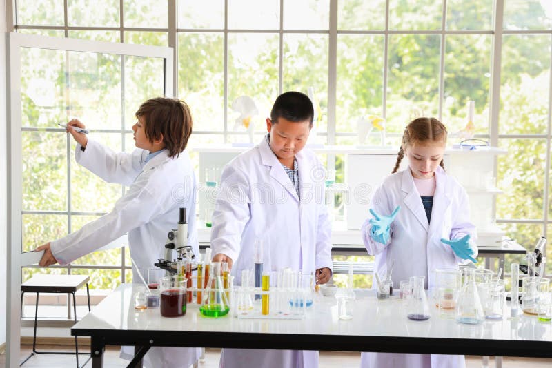 Happy Kids Making Science Experiments. Education and Scientist Concept ...