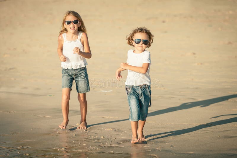 Happy Kids Playing on Beach Stock Photo - Image of activity, child ...