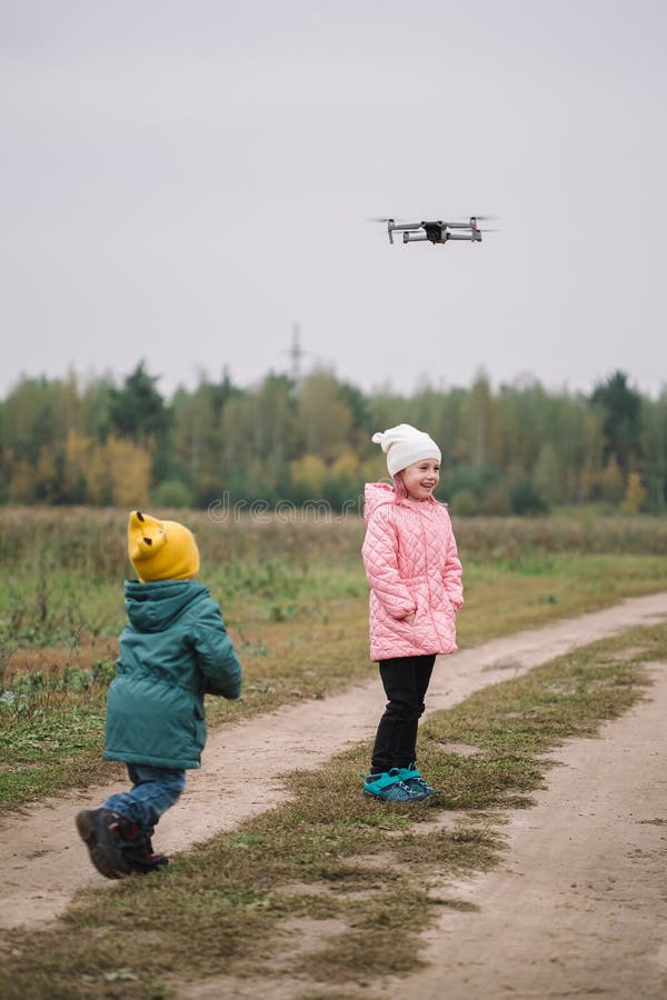Happy Kids Playing with Drone in the Field Autumn Time Stock Photo ...