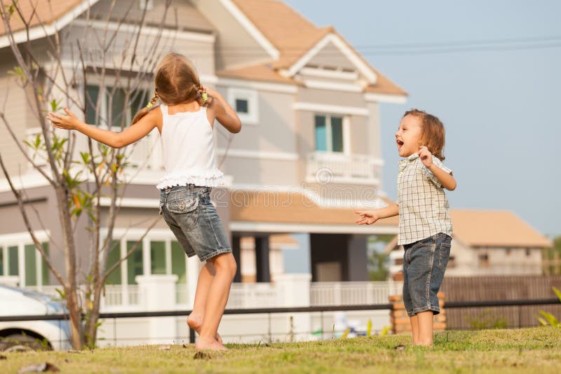 Happy Kids Playing on the Grass. Stock Photo - Image of healthy, active ...