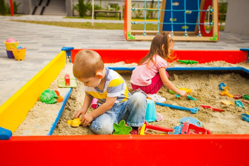 Happy Kids Playing with Sand at Playground. Outdoors Creative ...