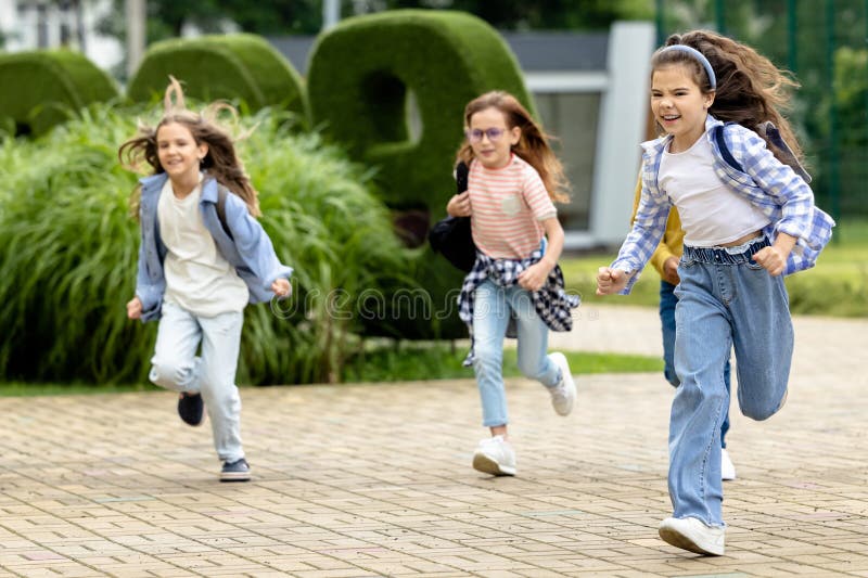 Happy Kids Running at the School Yard Stock Photo - Image of ...