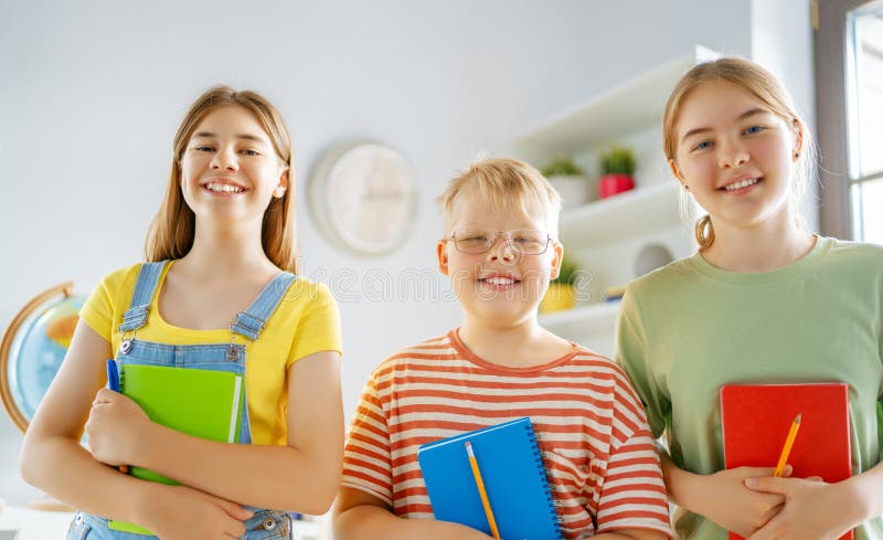 Happy kids at school stock image. Image of book, laughing - 253191509