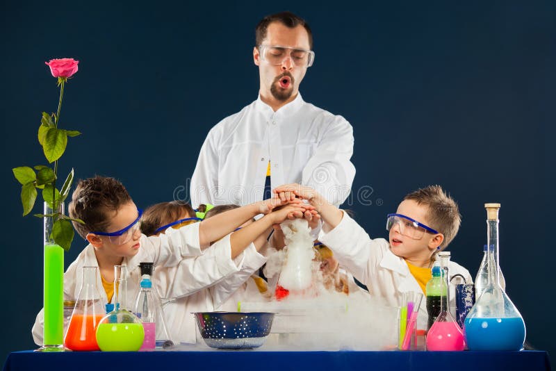 Happy Kids with Scientist Doing Science Experiments in the Laboratory ...