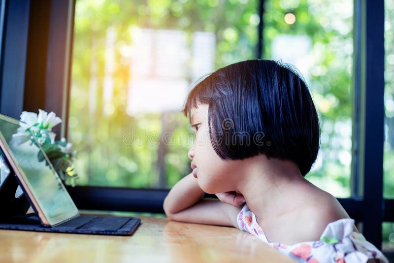 Happy Kids Using a Laptop Computer at Home Stock Photo - Image of kids ...