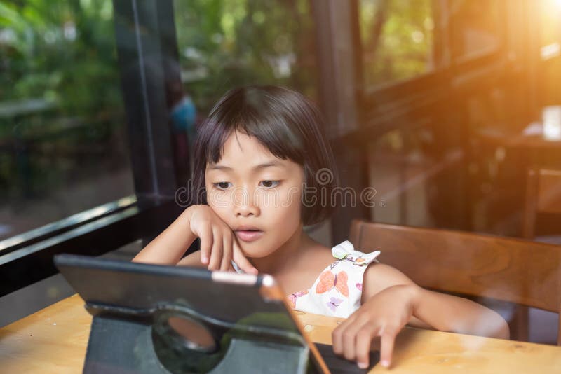 Happy Kids Using a Laptop Computer at Home Stock Photo - Image of ...