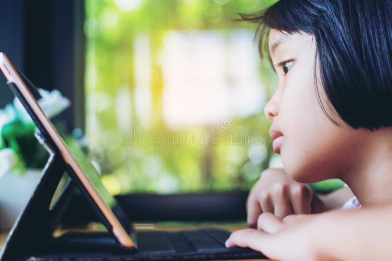 Happy Kids Using a Laptop Computer at Home Stock Image - Image of home ...