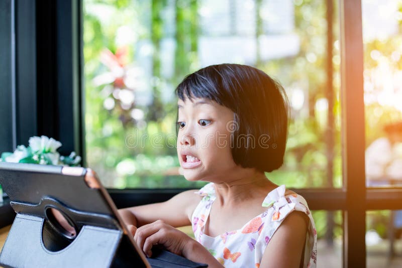 Happy Kids Using a Laptop Computer at Home Stock Image - Image of ...
