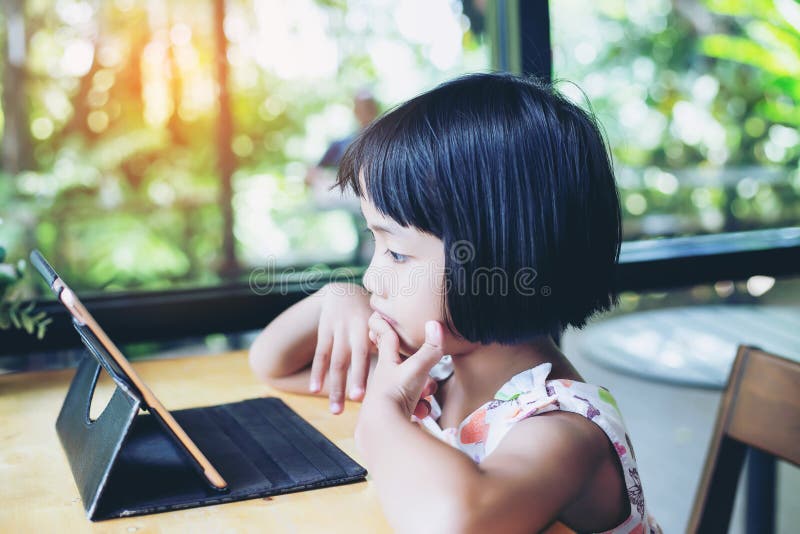 Happy Kids Using a Laptop Computer at Home Stock Image - Image of ...