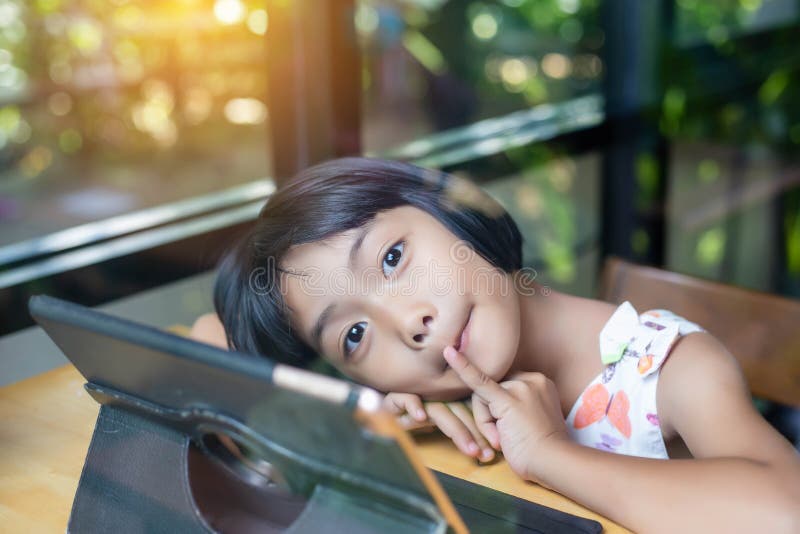 Happy Kids Using a Laptop Computer at Home Stock Photo - Image of ...