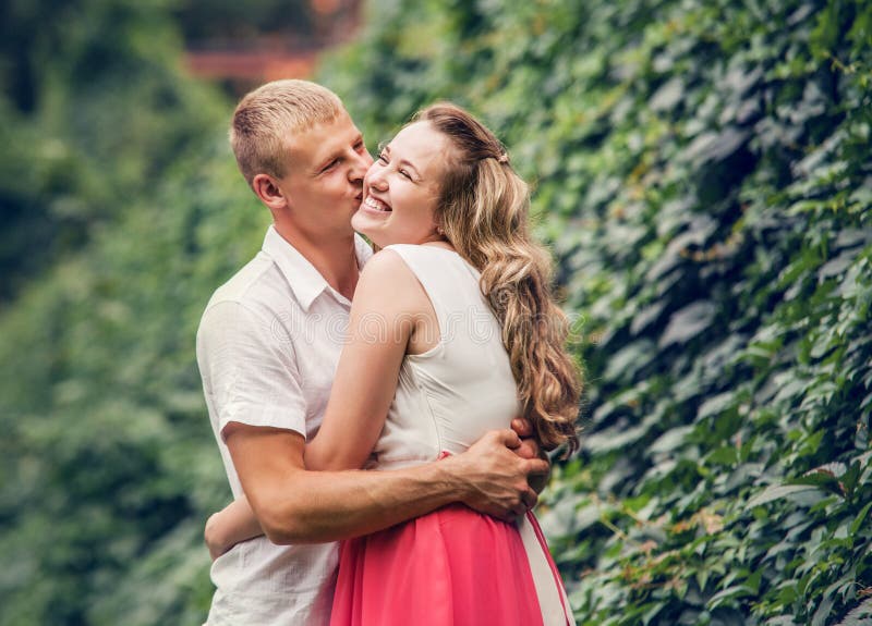 Happy kissing couple stock image. Image of kiss, girl - 9641729