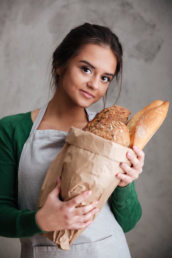 Happy Young Lady Baker Standing at Bakery Near Bread Stock Photo ...
