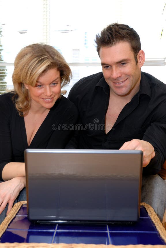 Happy laptop pair stock image. Image of businesswoman - 1935639