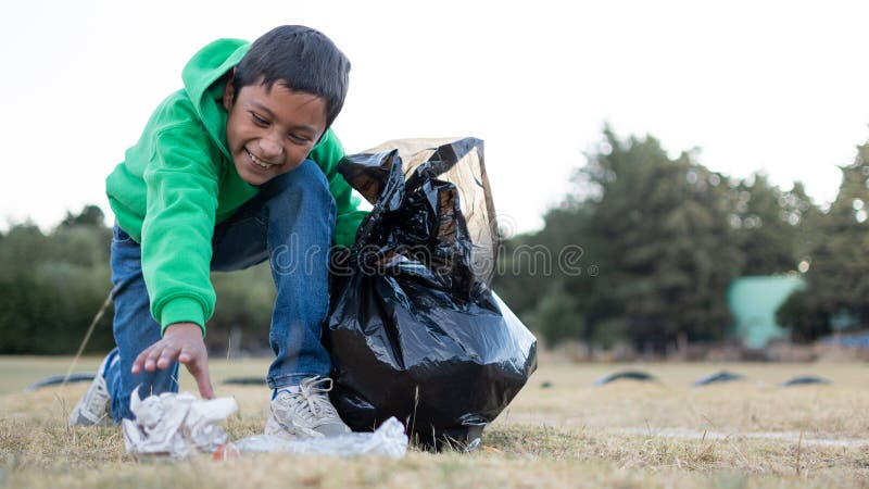 Happy Latin Boy Collecting Garbage from the Forest Stock Image - Image ...