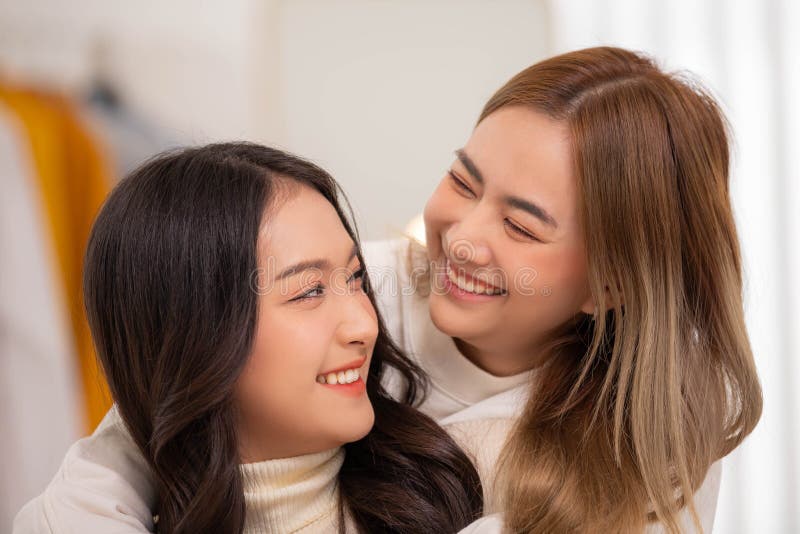 Happy Lgbt Lesbian Couple Lesbian Embracing And Looking Together With