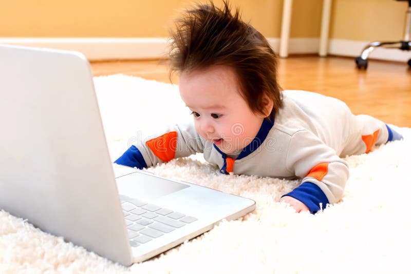 Happy Little Baby Boy with a Laptop Stock Image - Image of multiracial ...