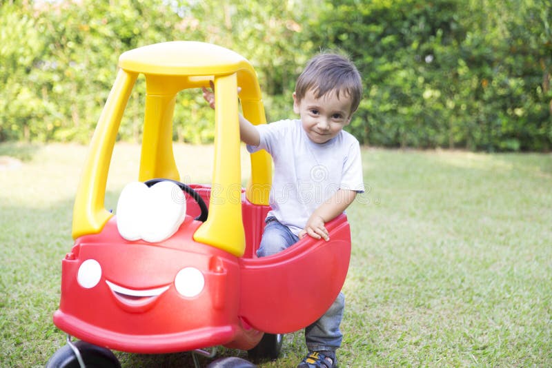 Happy Little Boy Driving His Toy Stock Photo - Image of games ...