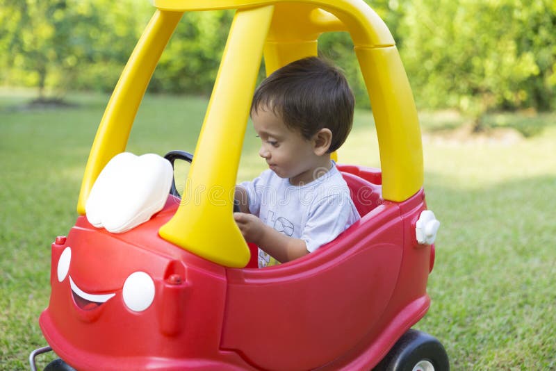 Happy Little Boy Driving His Toy Stock Image - Image of family, driving ...