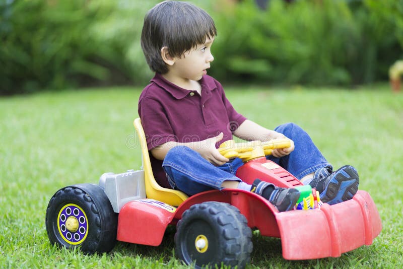 Happy Little Boy Driving a Toy Car Stock Image - Image of adventure ...