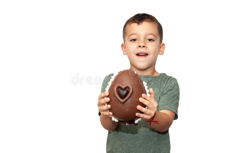 Happy Little Boy with Easter Chocolate Egg on Light Background Stock ...