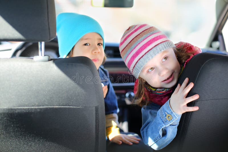 Happy Little Boy and Girl Sitting Inside the Stock Photo - Image of ...
