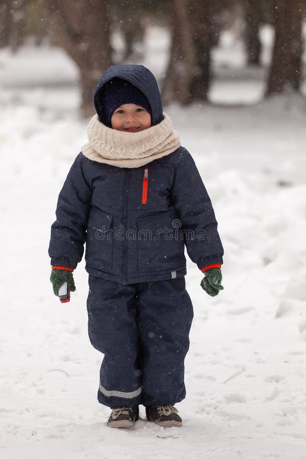 Happy Little Boy at the Park in Winter Snow Stock Image - Image of ...