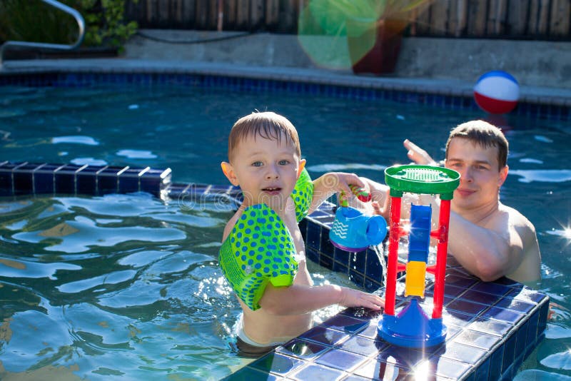 Happy Little Boy Playing in the Pool Stock Photo - Image of pool ...