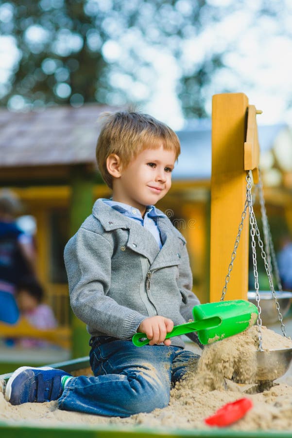 Group of Happy Children Playing in Sandbox at Playground Stock Image ...
