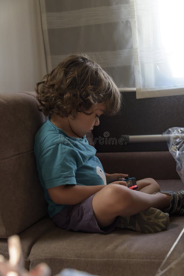 Happy Little Boy Playing Video Games. Child Using Video Game Controller ... Happy Little Boy Playing Video Games. Child Using Video Game Controller ...