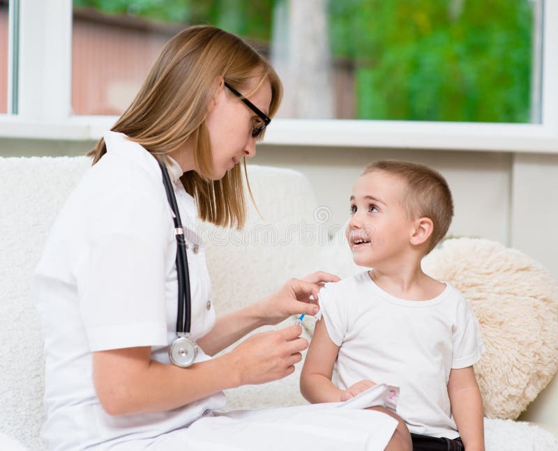 Happy Little Boy Receiving Injection or Vaccine Stock Photo - Image of ...