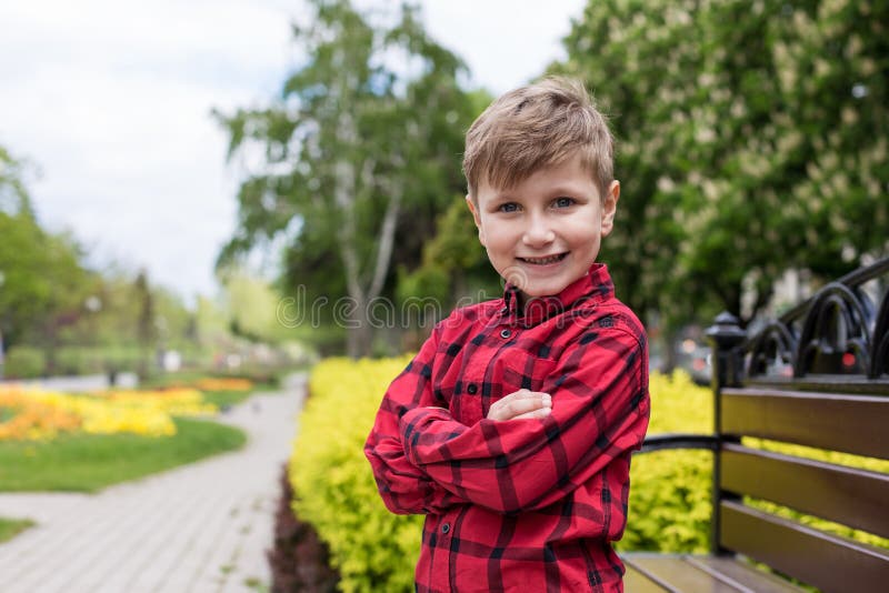 Happy Little Boy in the Red Shirt Stock Photo - Image of gesturing ...