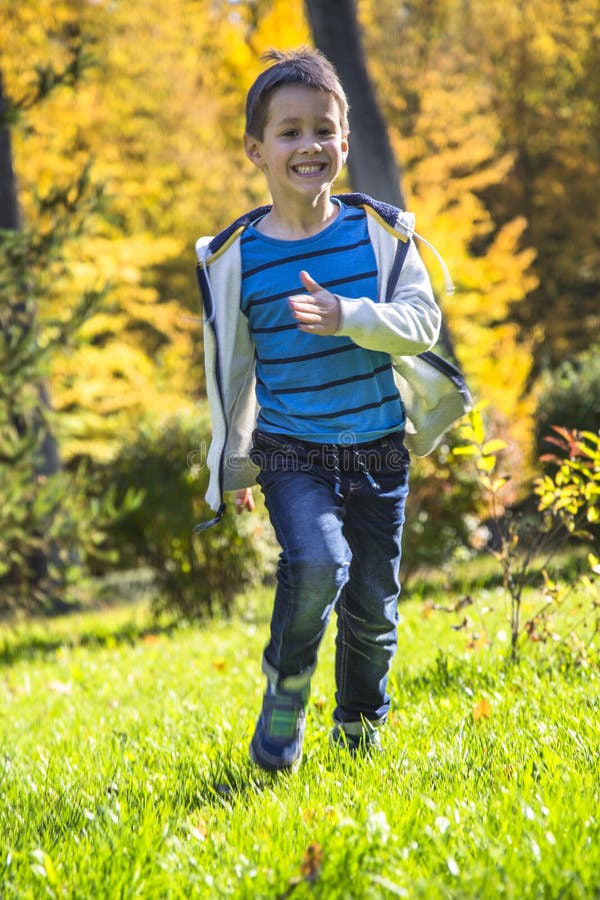 Happy Little Boy Run in the Autumn Park Stock Image - Image of nature ...