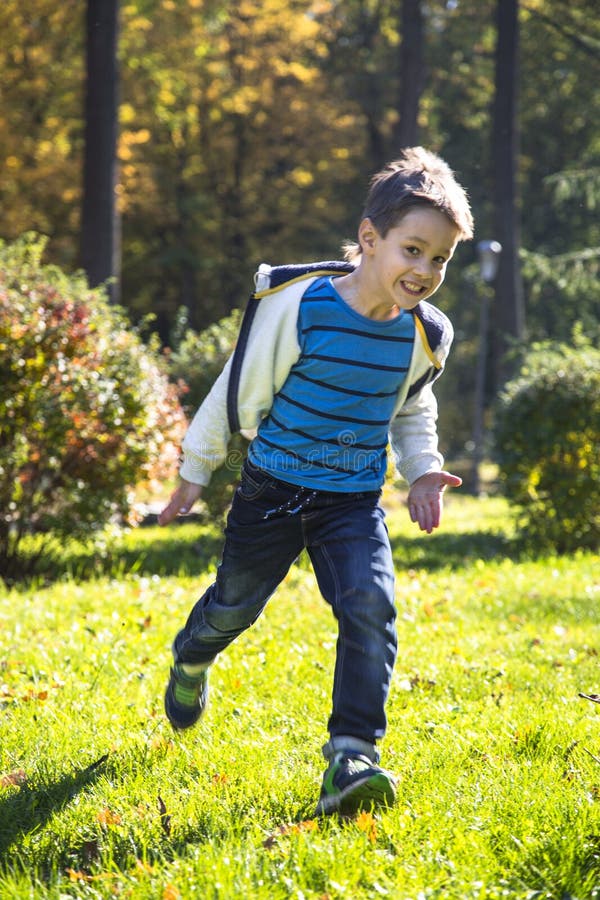 Happy Little Boy Run in the Autumn Park Stock Photo - Image of adorable ...
