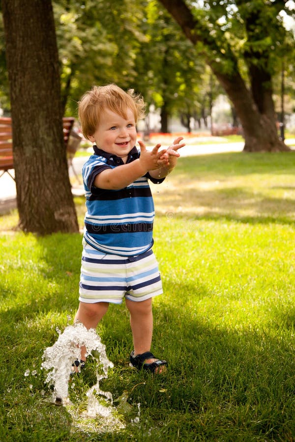 Happy little boy running stock photo. Image of caucasian - 25905692