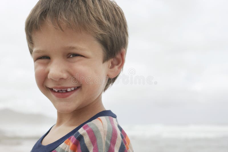 Smiling man at the beach stock photo. Image of caucasian - 20612912
