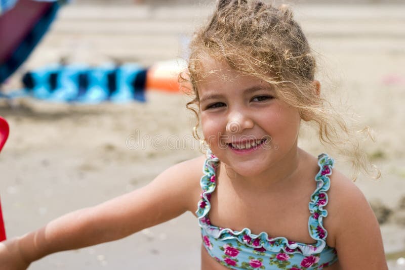 Happy Little Girl on the Beach Stock Image - Image of happy, sweet: 219961