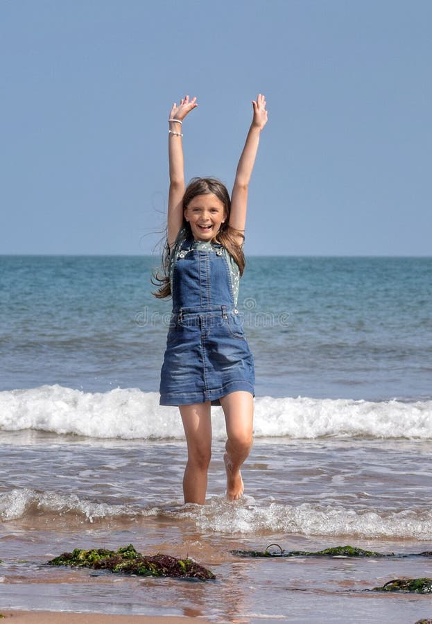 Happy Little Girl at the Beach in Dawlish, Devon. Stock Photo - Image ...