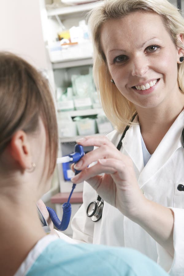 Happy Little Girl at the Doctor for a Checkup Stock Photo - Image of ...