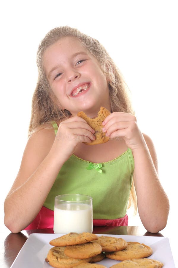 Happy Little Girl Eating Cookies Stock Image - Image of food, biscuits ...