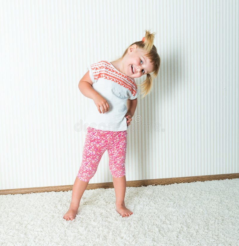 Happy Little Girl Engaged in Physical Activity Stock Image - Image of ...