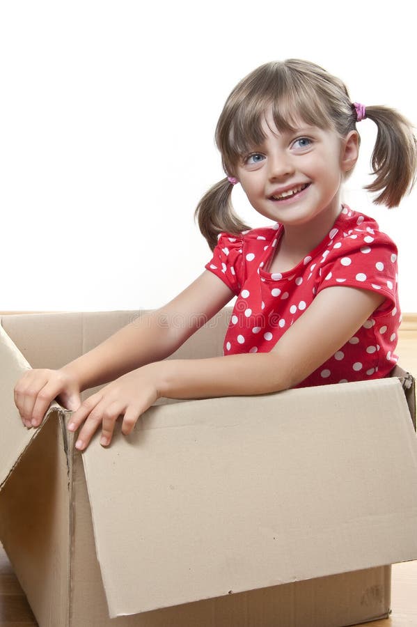 Happy Little Girl Inside a Paper Box Stock Photo - Image of excited ...
